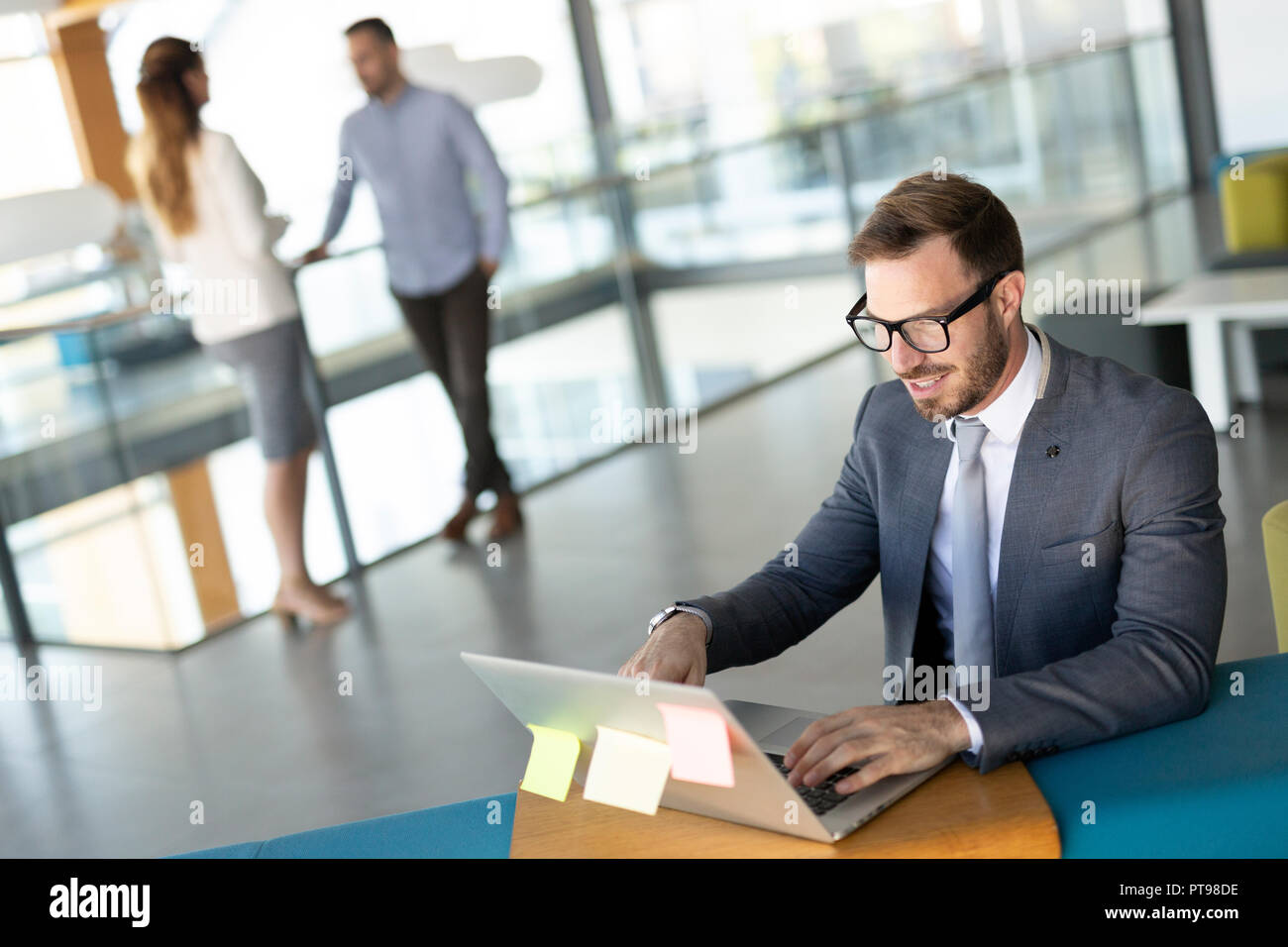 Young business man leadership of big successful enterprise is checking ...