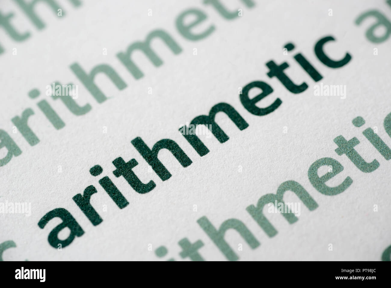 word arithmetic printed on white paper macro Stock Photo - Alamy
