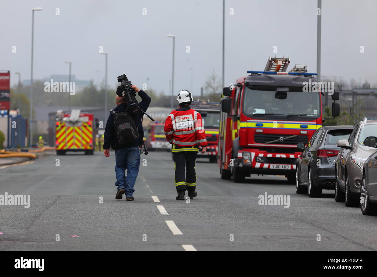 Fire engines from West Yorkshire Fire & Rescue attend an industrial ...