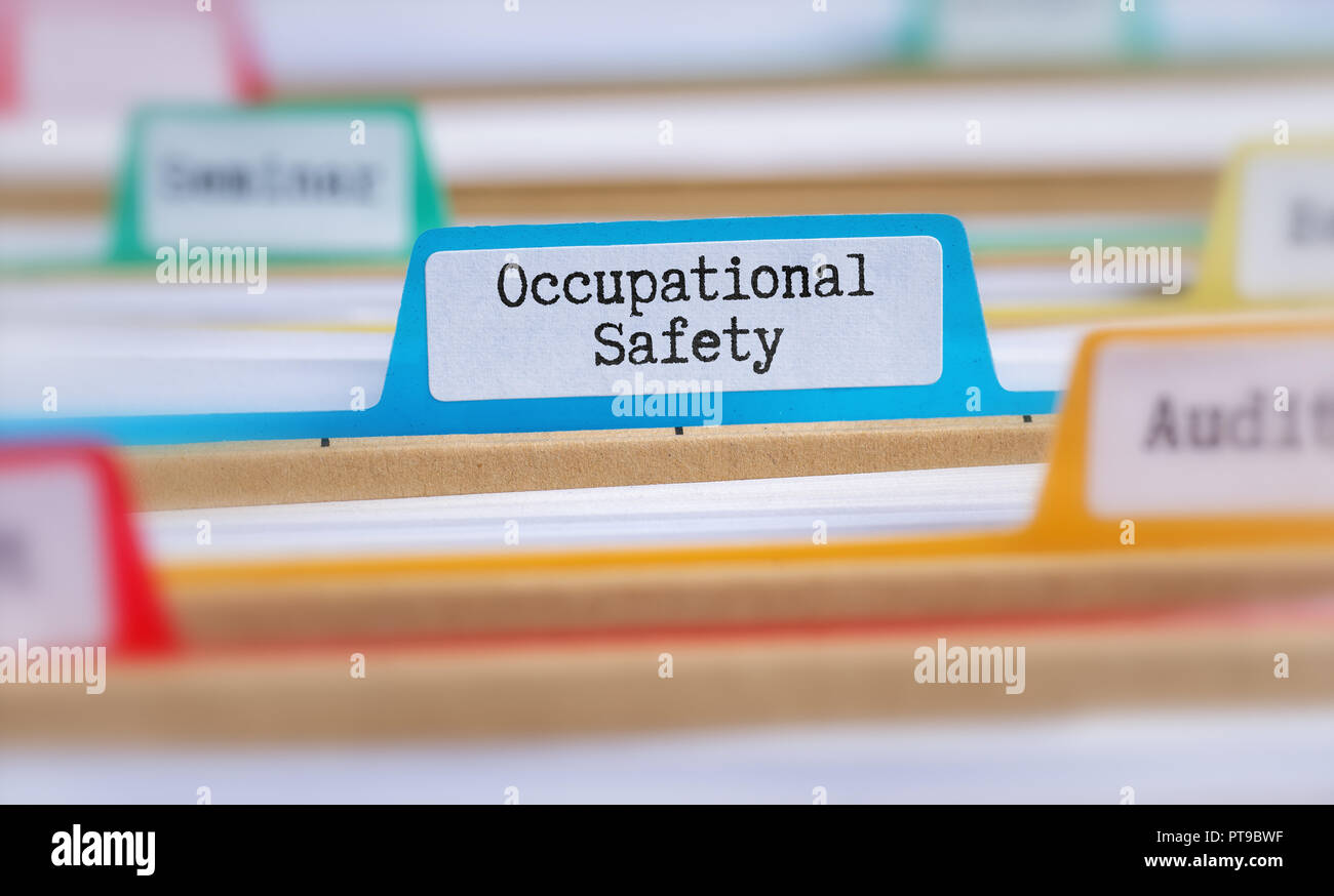 File folders with a tab labeled Occupational Safety Stock Photo - Alamy