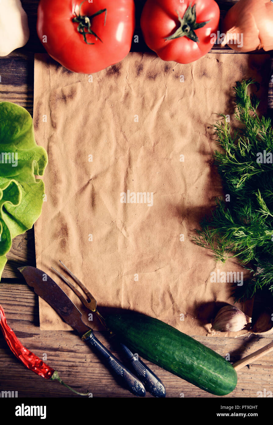 Vintage paper and vegetables around it - food background for recipes ...
