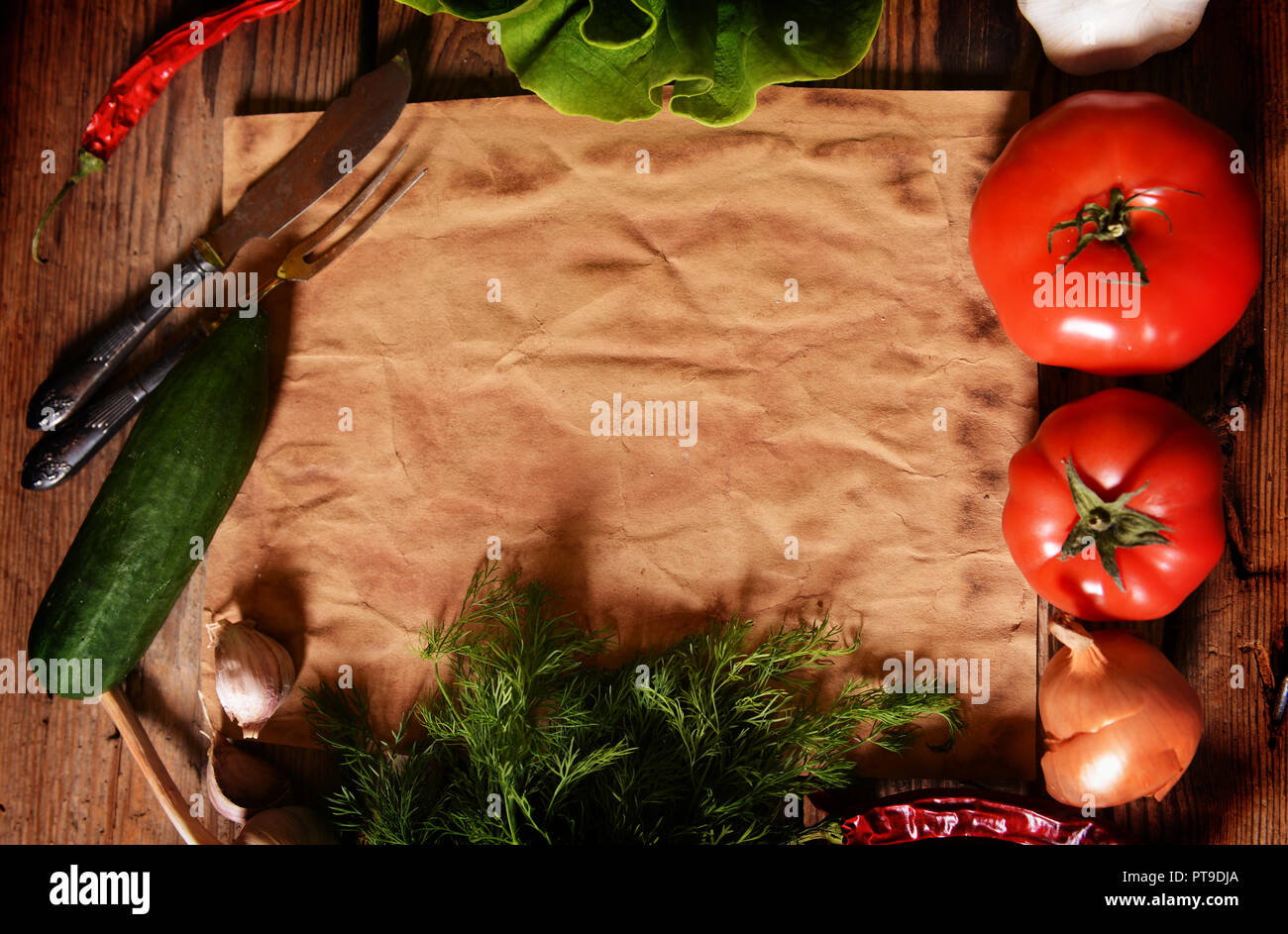 Vintage paper and vegetables around it - food background for recipes ...
