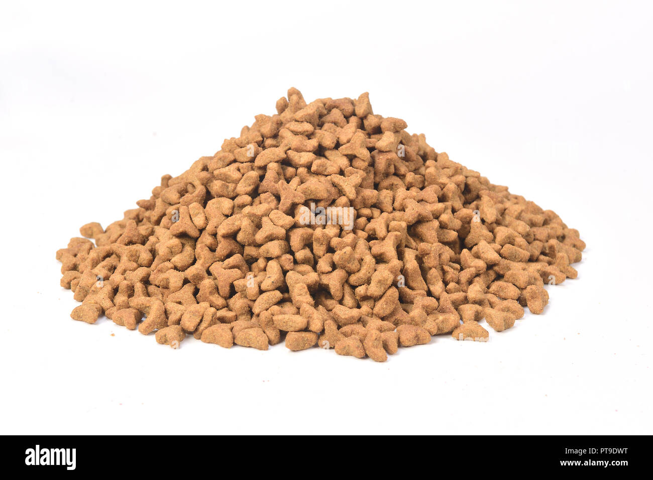 a pile of cat food on white background Stock Photo - Alamy