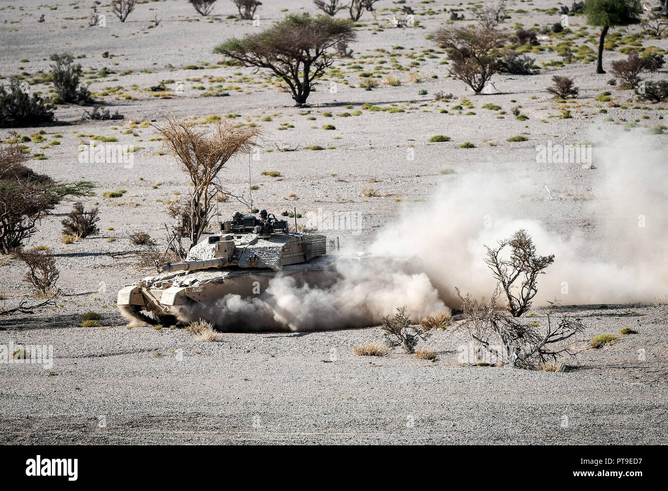 A Challenger II Main Battle Tank makes a simulated attack on an enemy ...