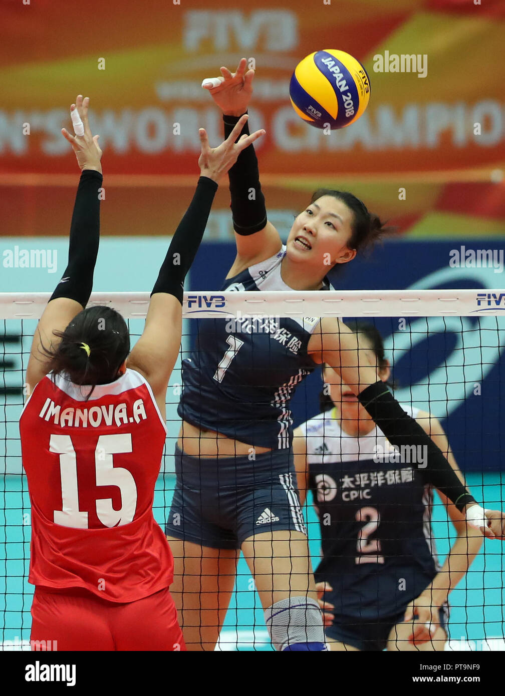 Osaka, Japan. 8th Oct, 2018. Yuan Xinyue (C) of China spikes during the ...