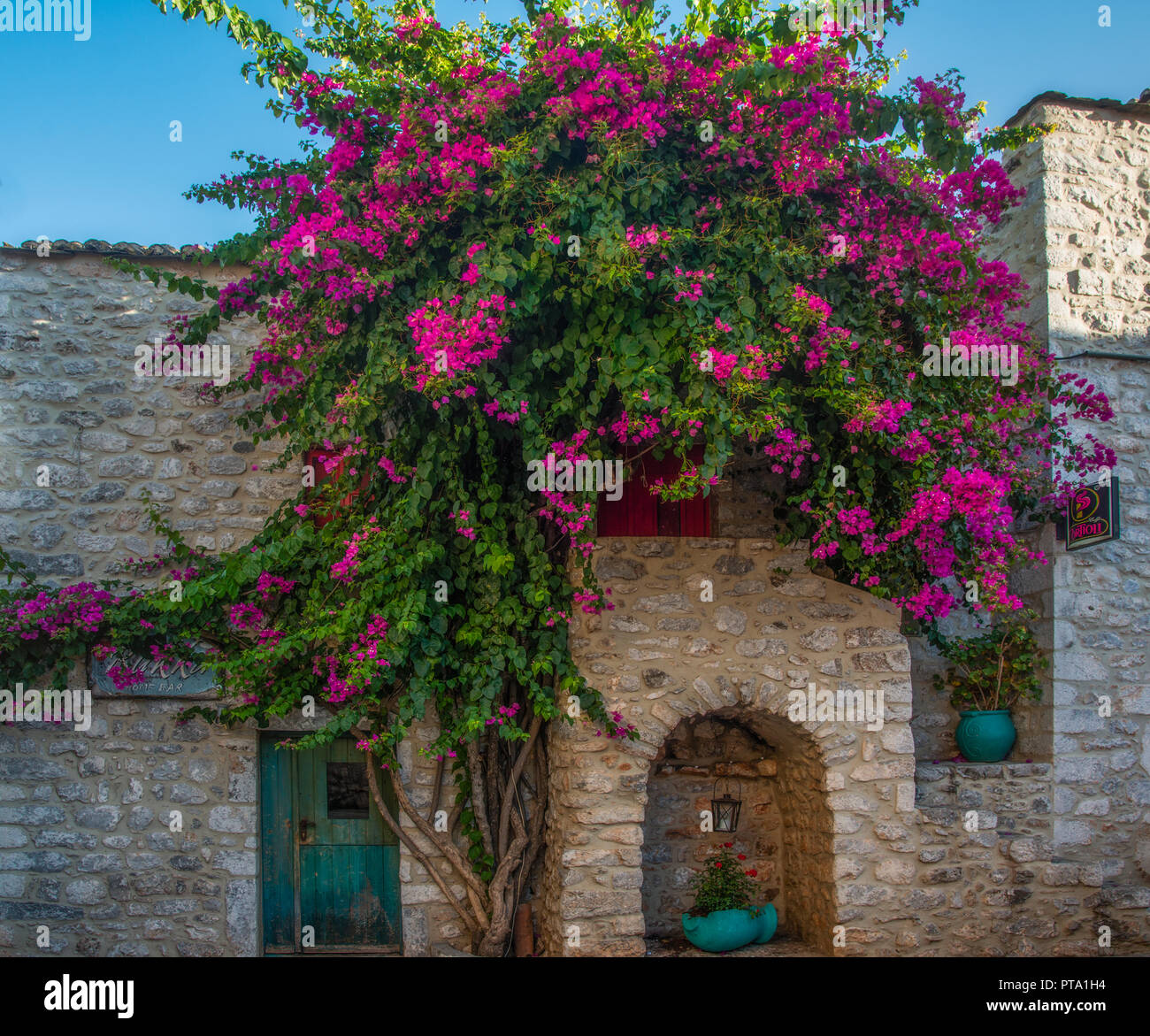 Beautiful old rock building in Areopoli Stock Photo - Alamy