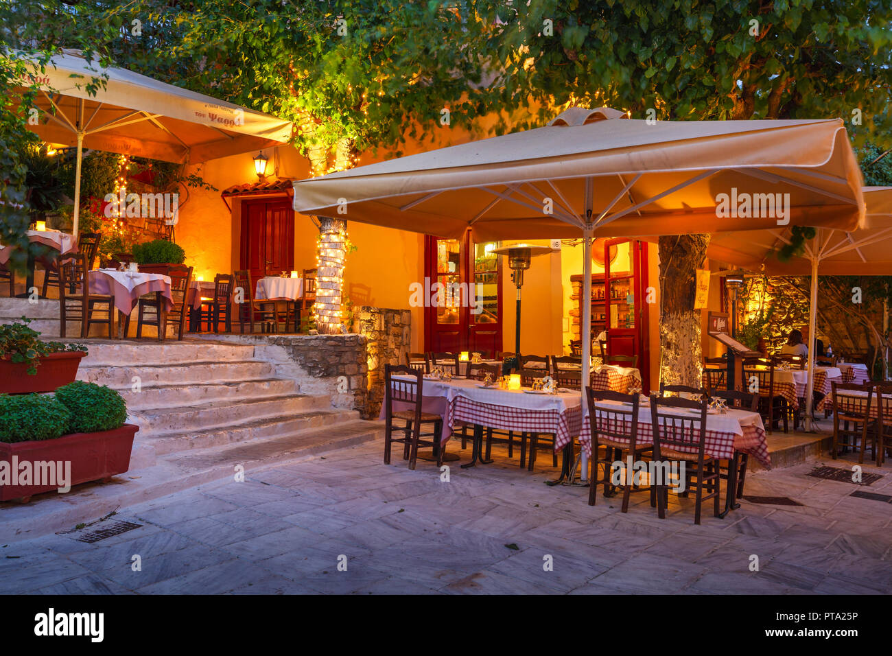 Athens, Greece - September 25, 2018: Taverna in a street of Plaka ...