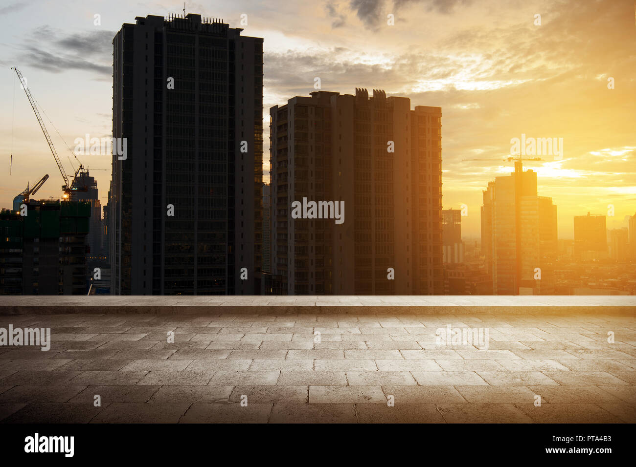 Rooftop view with skyscrapers building and modern city at sunset Stock ...