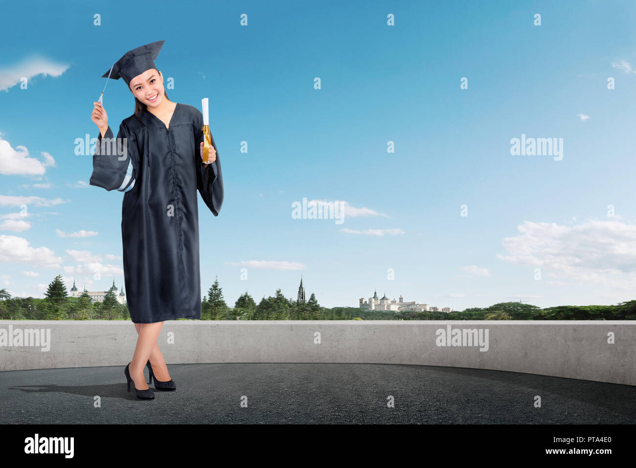 Graduation girl holding her diploma hi-res stock photography and images ...
