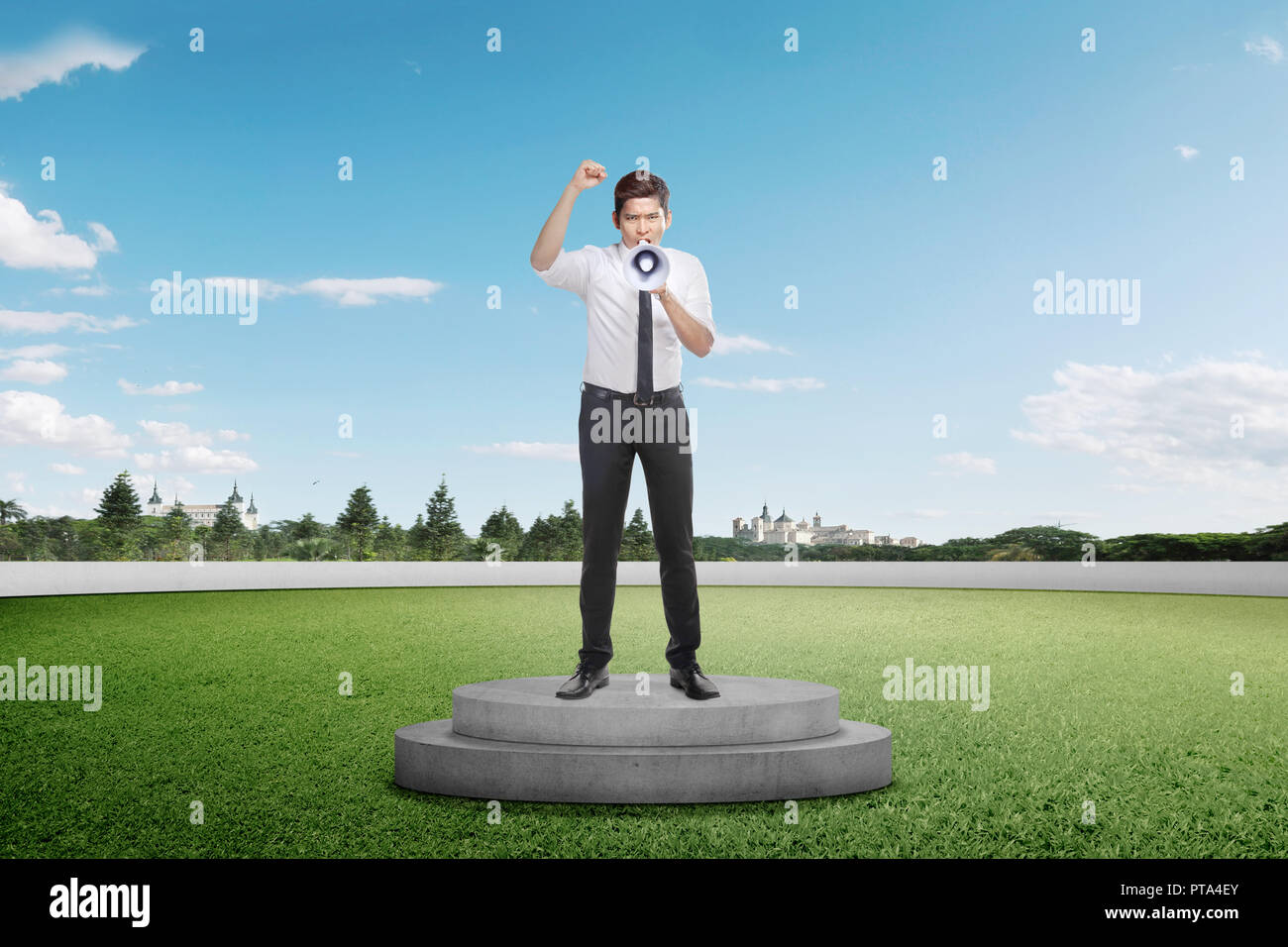 Businessman standing podium hi-res stock photography and images - Alamy
