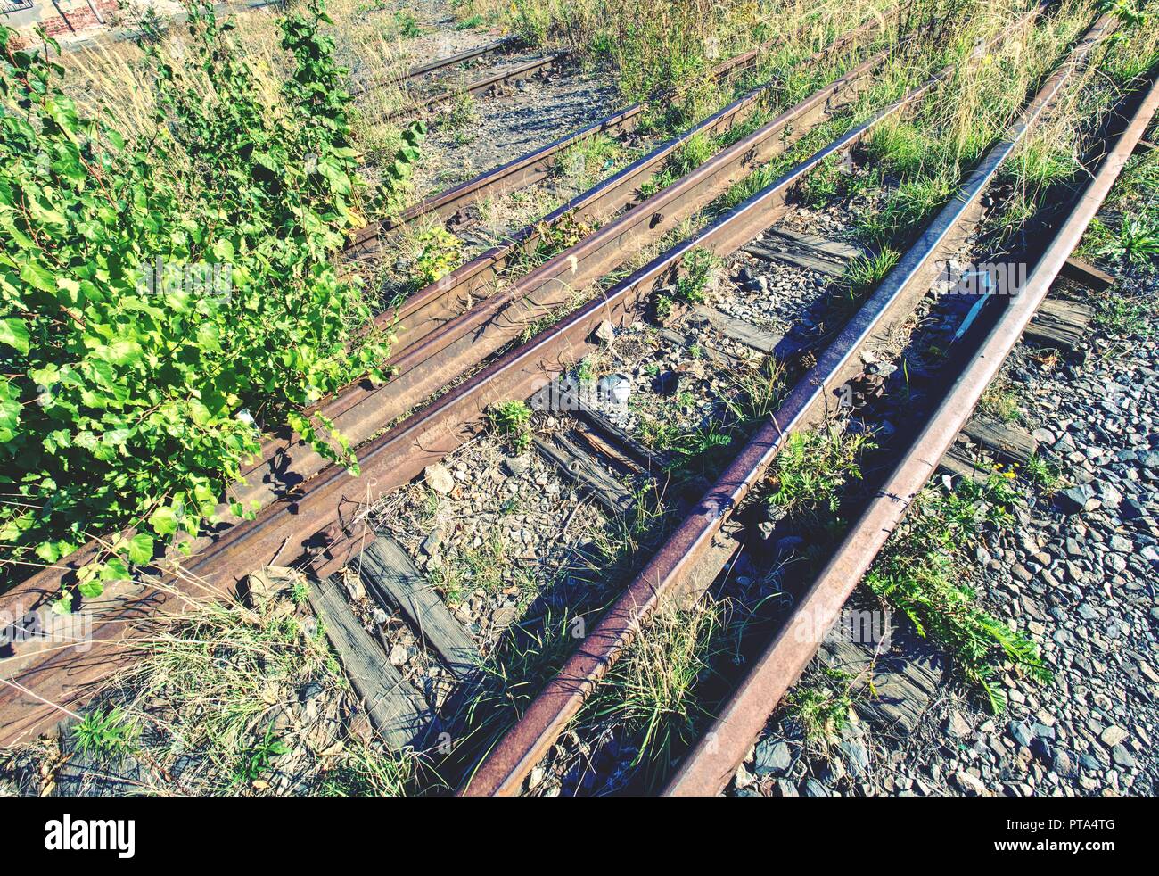 Old rusty railways. Railway details of rails joint with screws and nuts ...