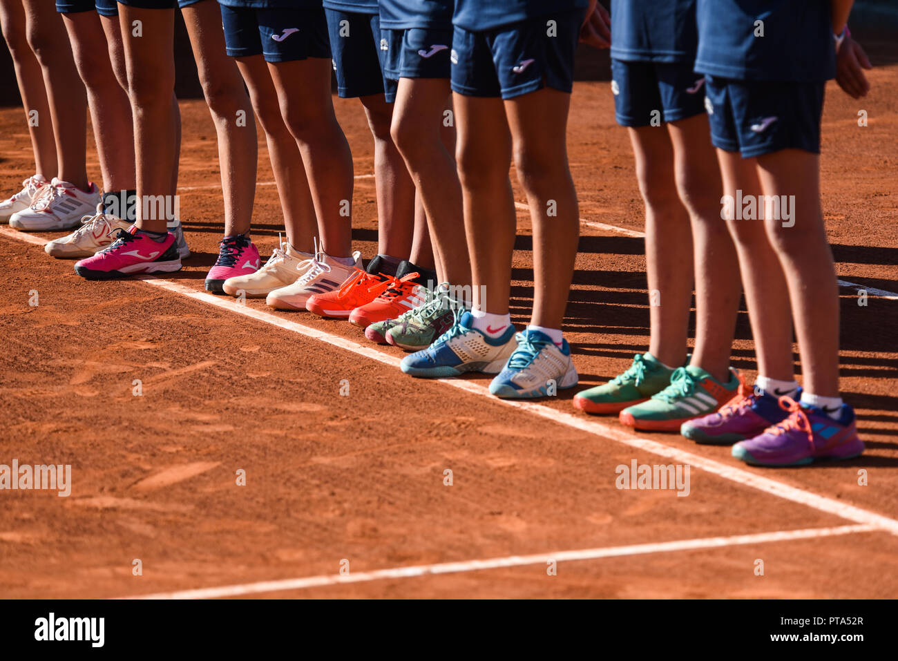 Detail of the legs and shoes of a group of young athletes Stock Photo ...