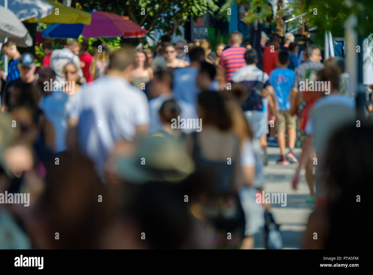 Unidentified crowd of people walking on the street Stock Photo - Alamy