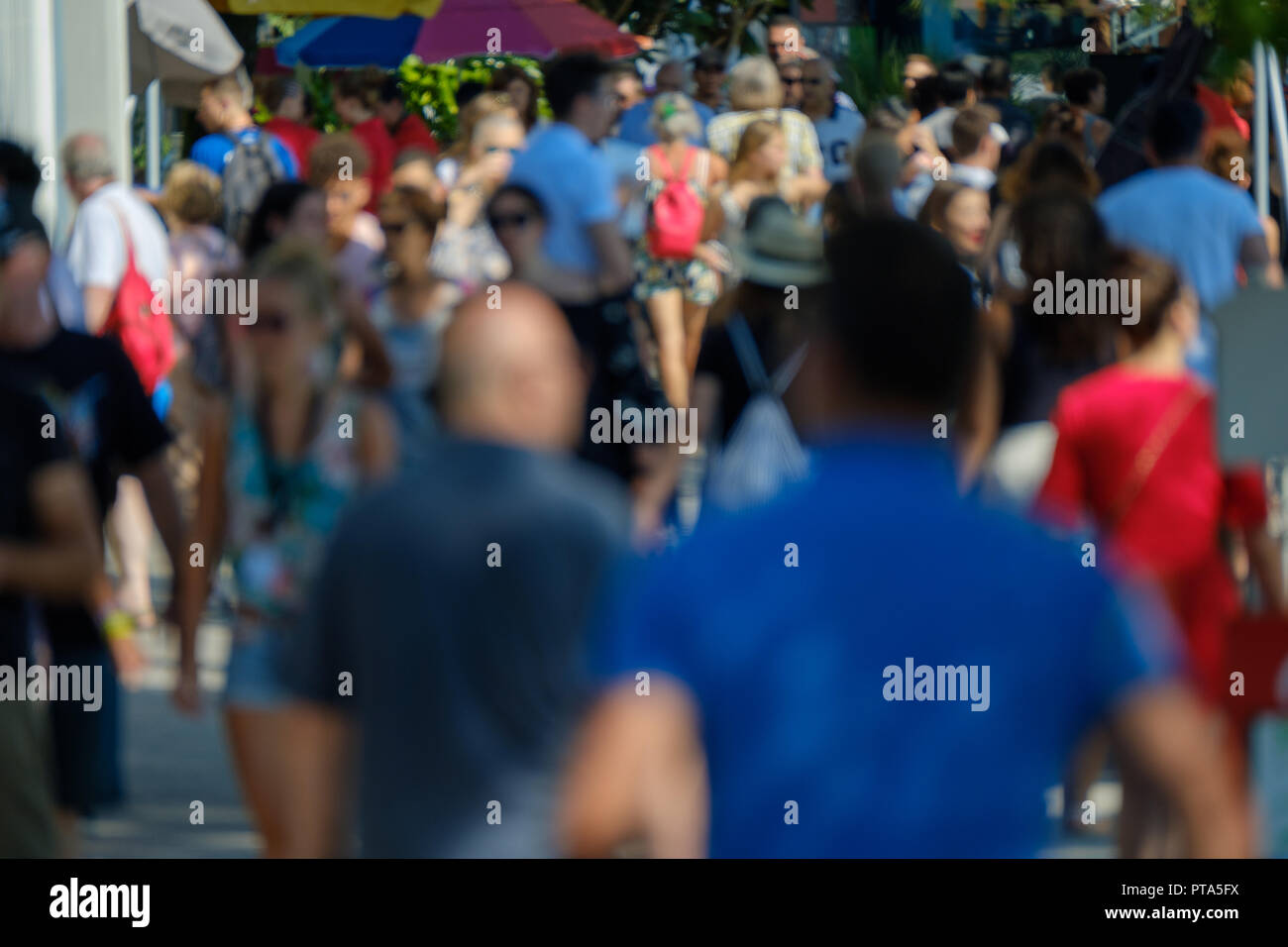 Unidentified crowd of people walking on the street Stock Photo - Alamy