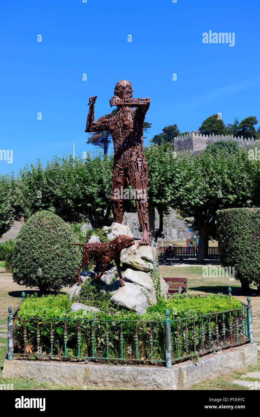 Monument to hunter statue in front of Bayona / Baiona castle Spain ...