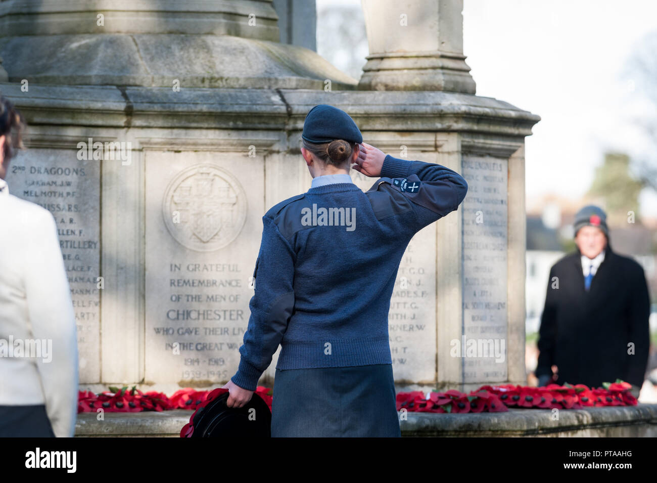 Chichester, West Sussex, UK. 12th November 2017. A female cadet salutes ...