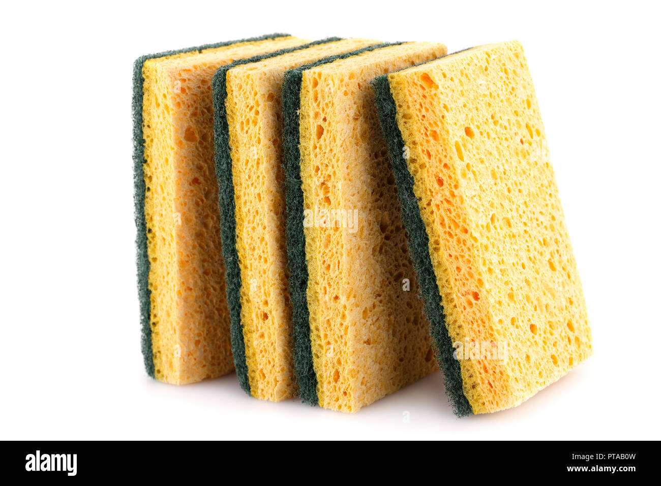 Pile of sponges isolated on white background Stock Photo - Alamy