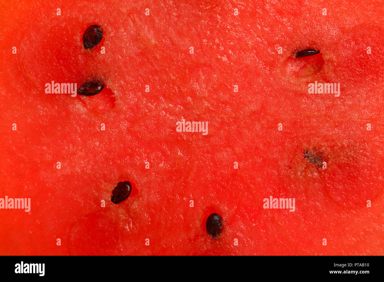 Close up full frame background texture of fresh red ripe juicy ...