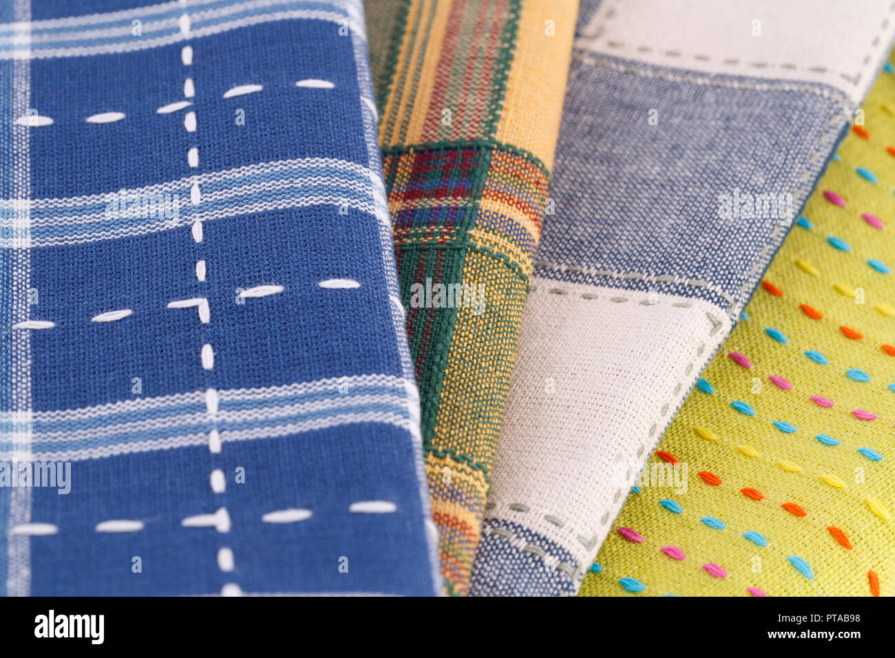 Stack of colorful kitchen towels closeup picture Stock Photo - Alamy