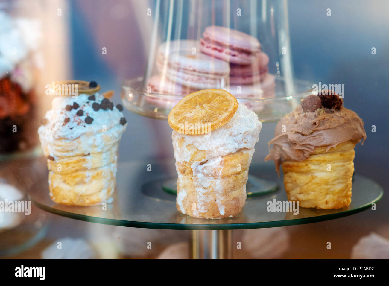 Different sweets in the confectionery store window Stock Photo - Alamy