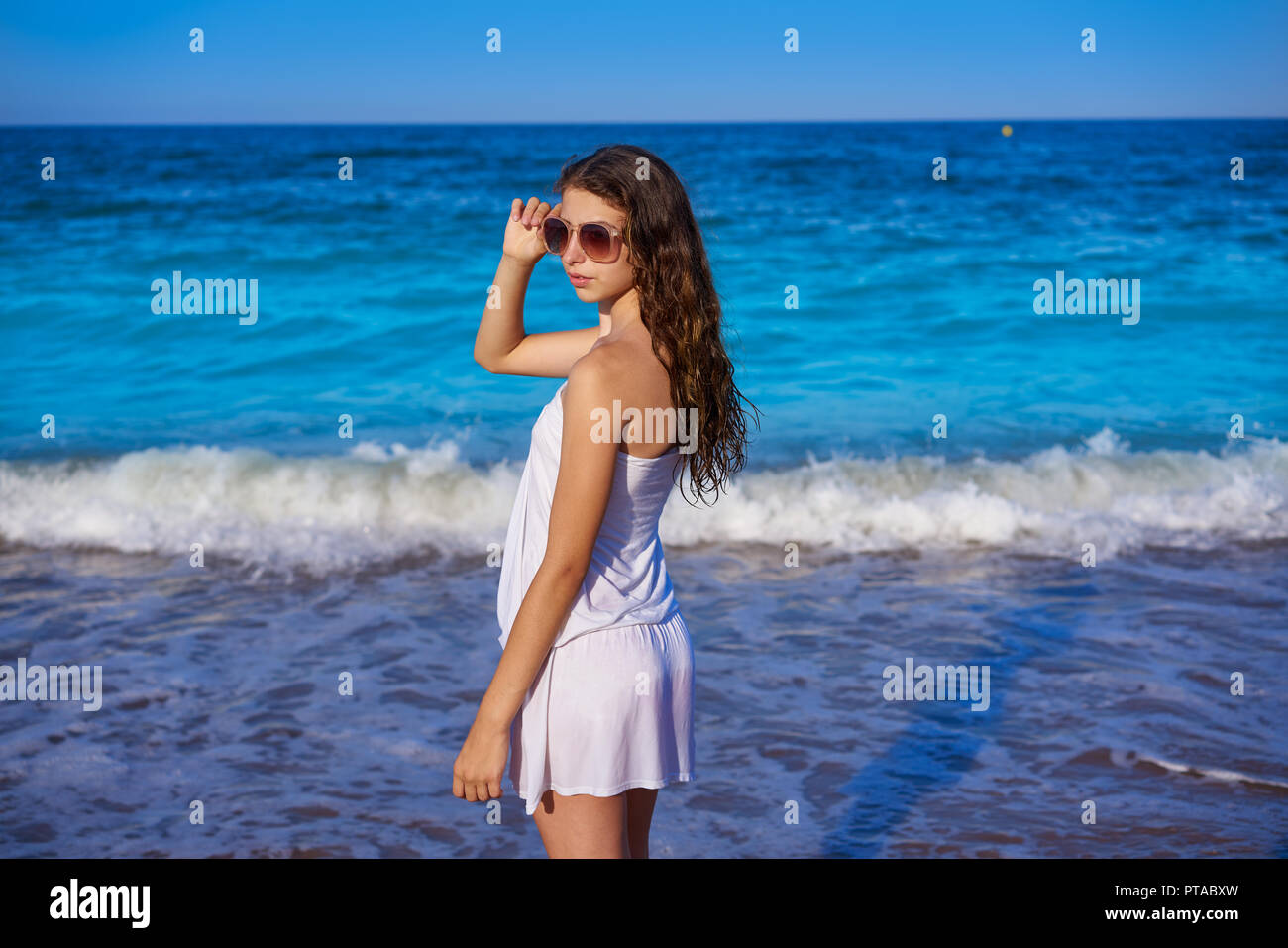 Tween girl in white dress hi-res stock photography and images - Alamy