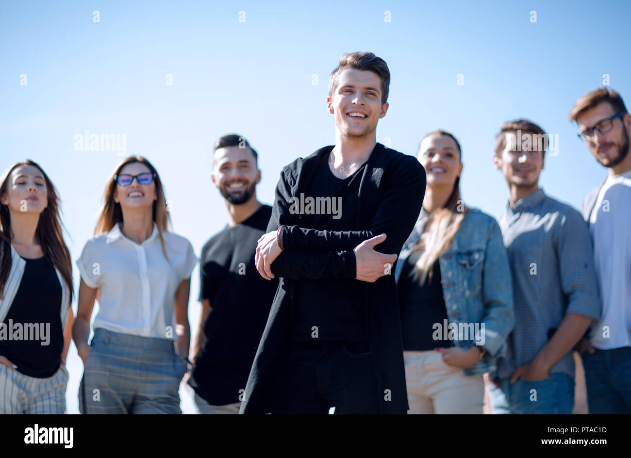 leader and creative business team on a light background Stock Photo - Alamy