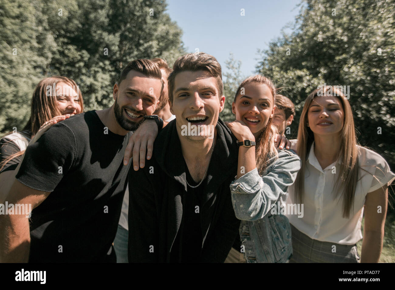 happy business team. team building outdoors Stock Photo - Alamy