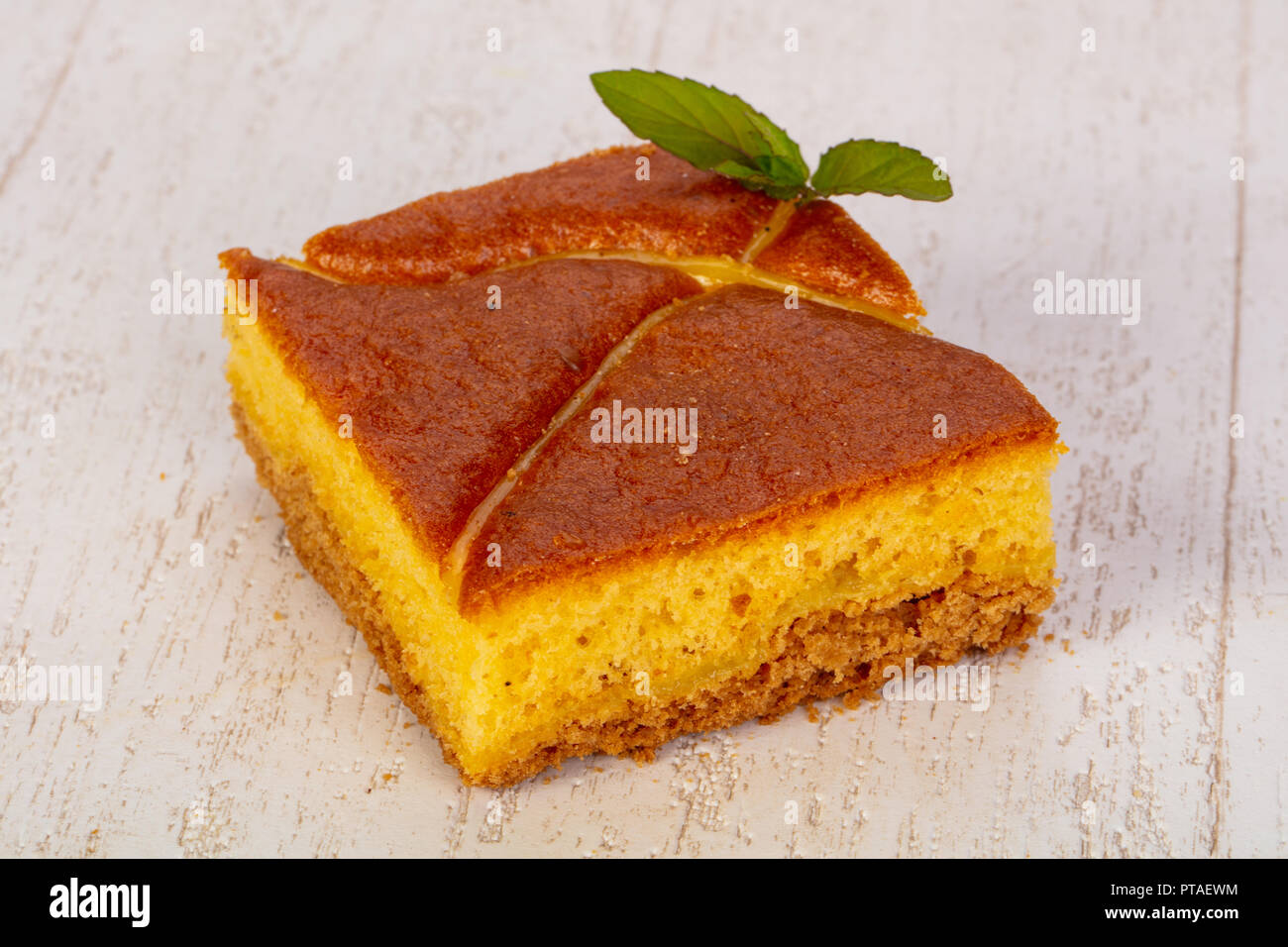 Tasty Sponge cake ower wooden background Stock Photo - Alamy