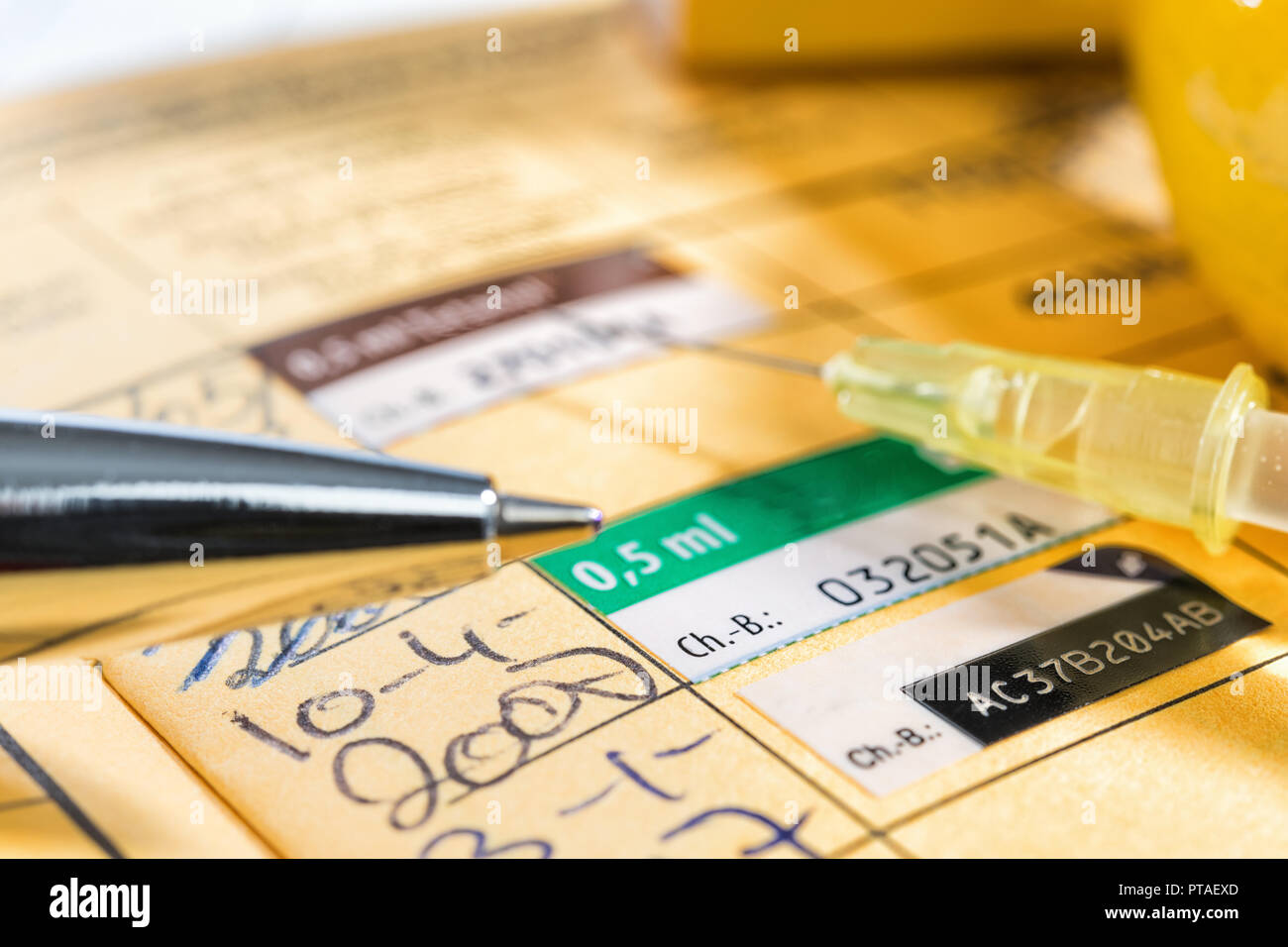 Vaccination certificate with stamp and ballpoint pen Stock Photo - Alamy