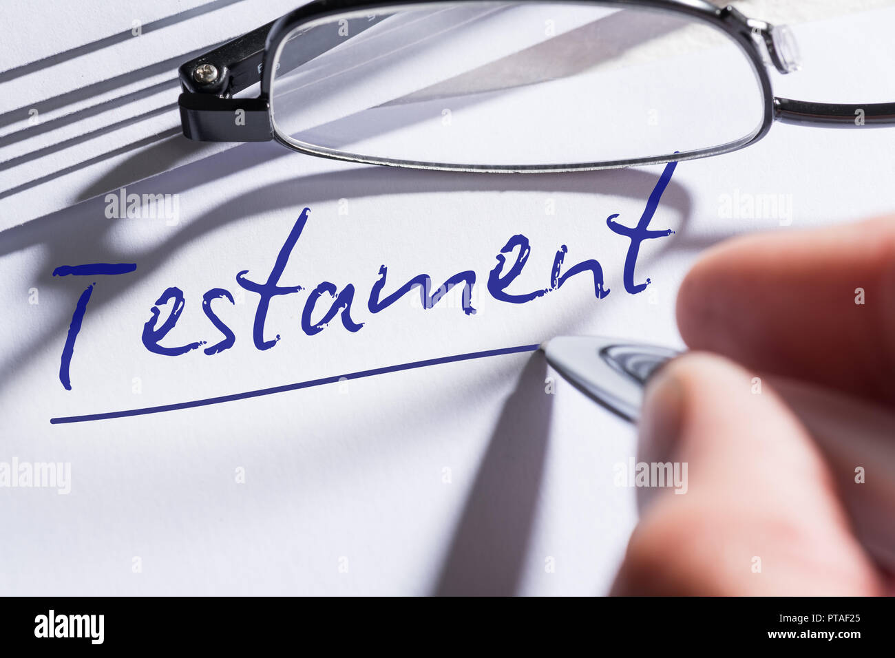 Testament with pen and glasses Stock Photo - Alamy