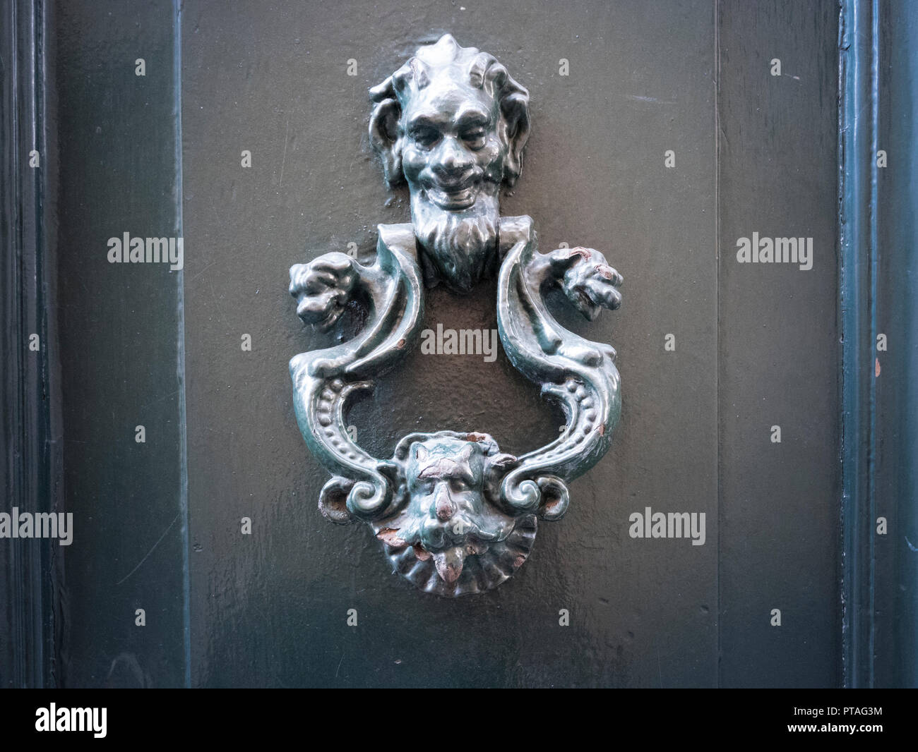 door handle in the form of a demon Stock Photo - Alamy
