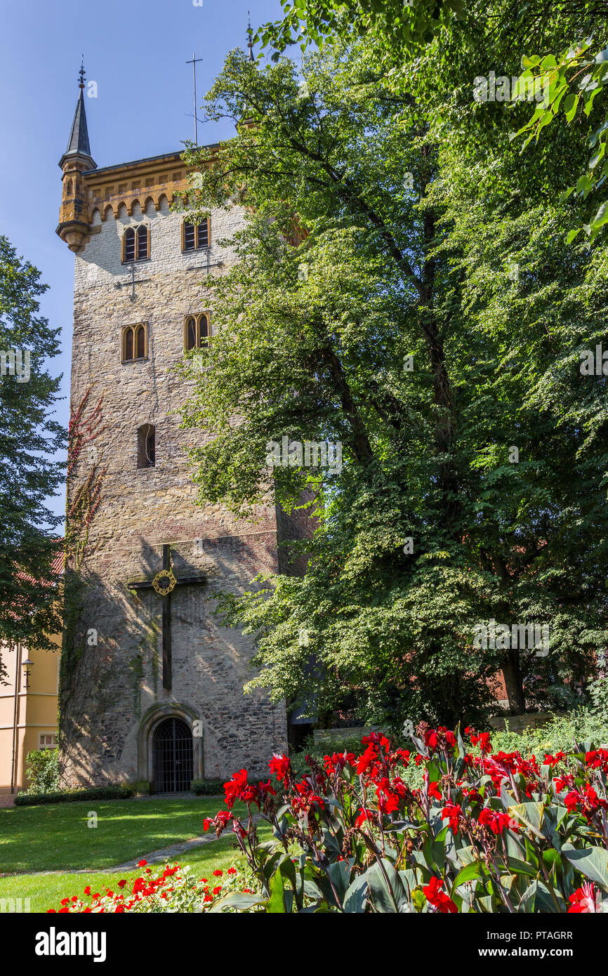 Church tower and red flowers in Warendorf, Germany Stock Photo - Alamy