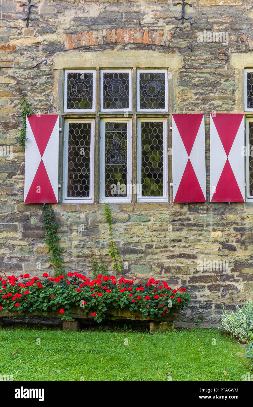 Flowers and window of the Burghof museum in Soest, Germany Stock Photo ...