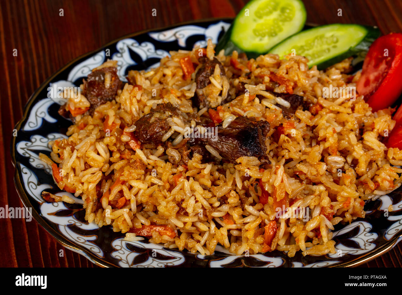 Uzbek traditional Plov with beef Stock Photo - Alamy