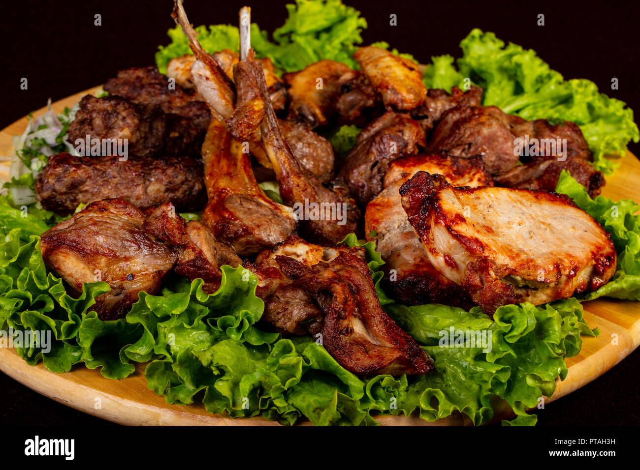 Grilled kebab mix plate assortment Stock Photo - Alamy