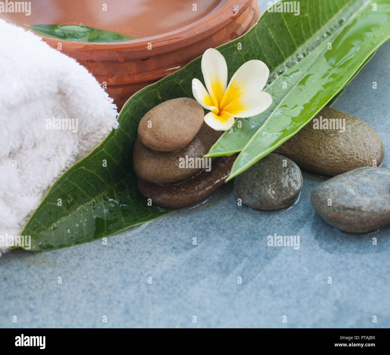 Organic spa objects and stones with towel for relax Stock Photo - Alamy