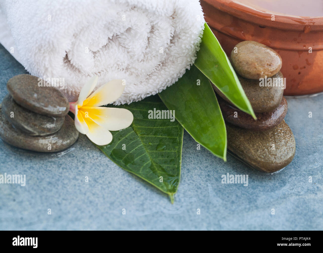 Spa objects with stones and flower for relaxation Stock Photo - Alamy