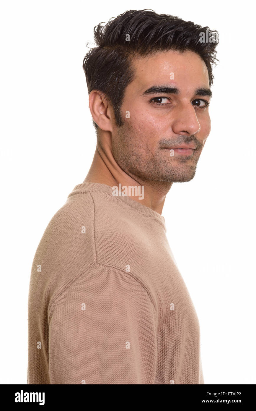 Young handsome Persian man against white background Stock Photo - Alamy