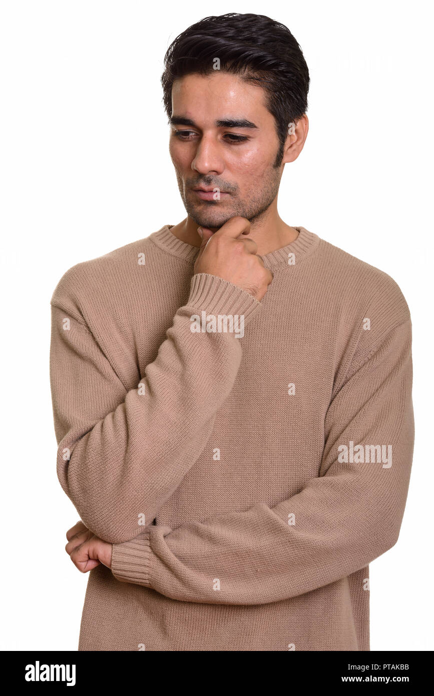 Young handsome Persian man against white background Stock Photo - Alamy