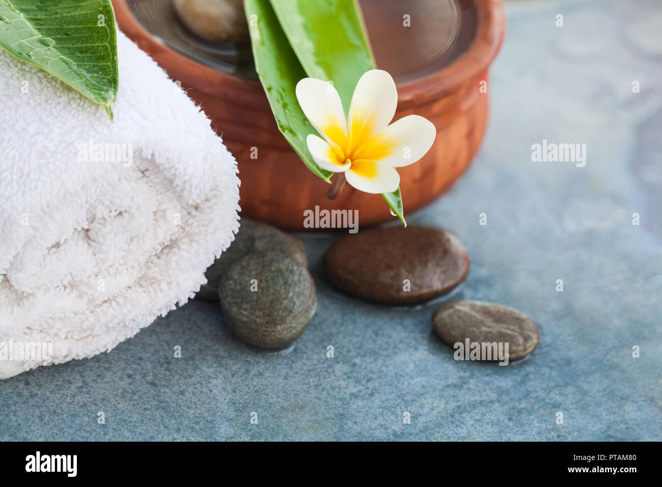 Spa objects and stones for relax salon on blue table background Stock ...