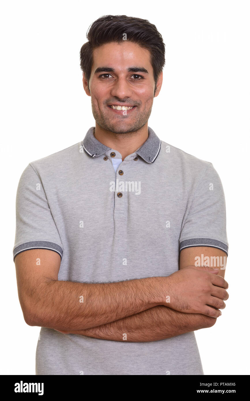 Young handsome Persian man against white background Stock Photo - Alamy