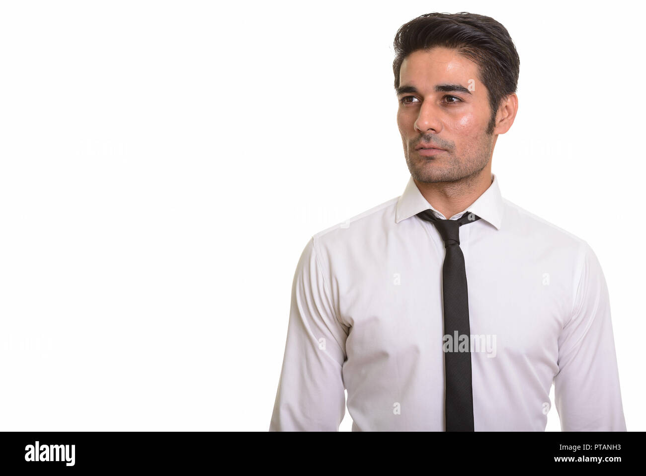 Young handsome Persian man against white background Stock Photo - Alamy