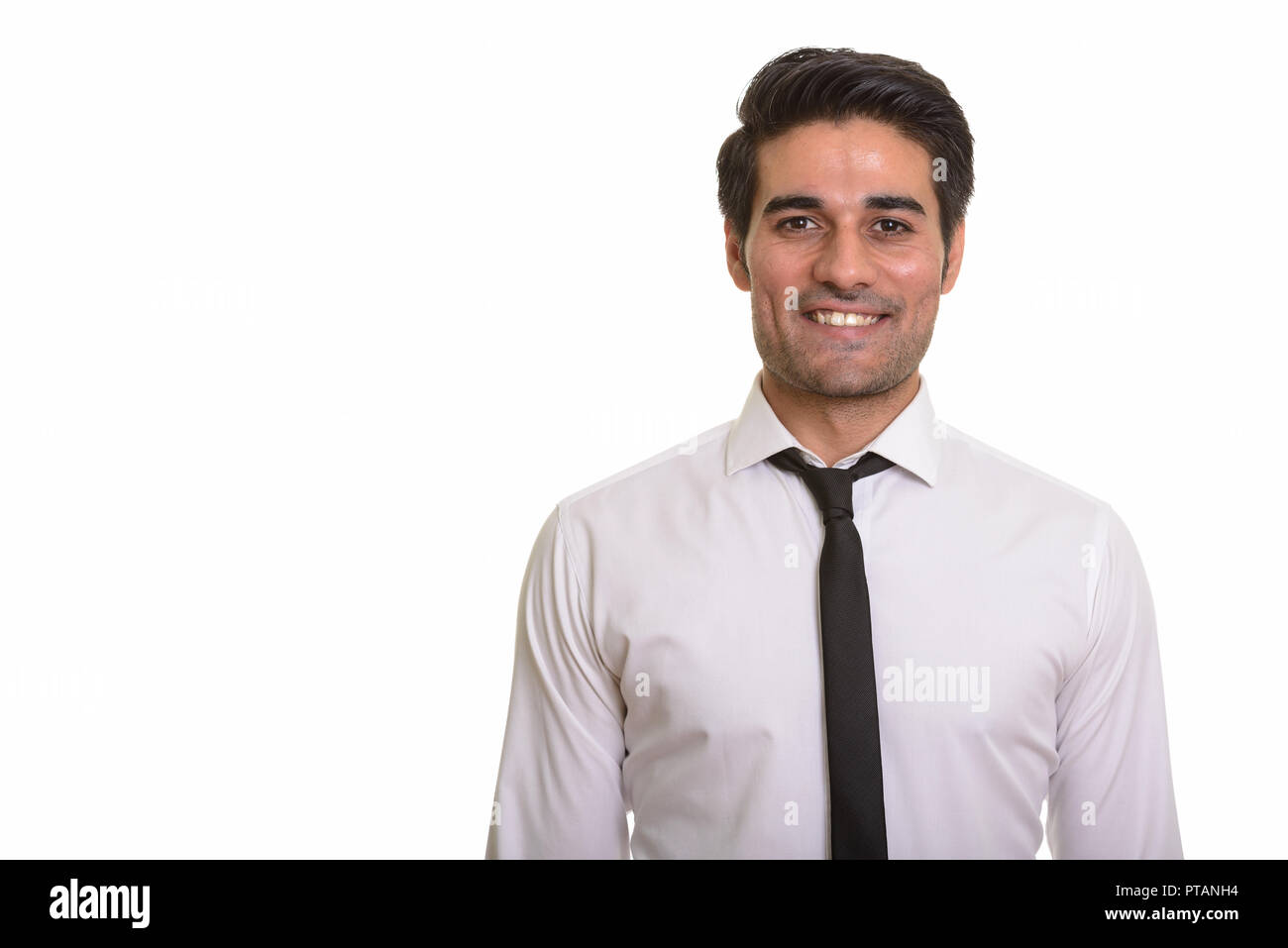Young handsome Persian man against white background Stock Photo - Alamy