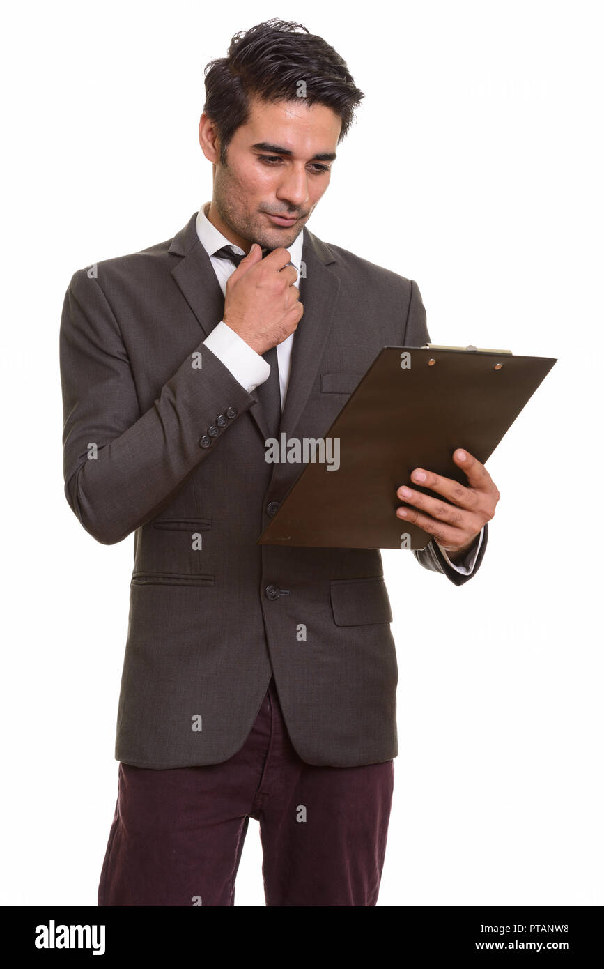 Young handsome Persian man against white background Stock Photo - Alamy