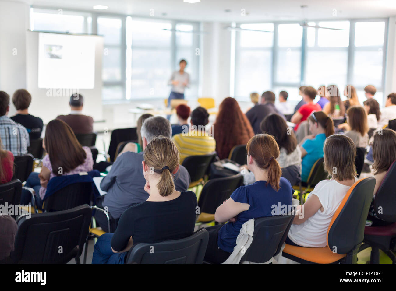 Speaker giving presentation talk on business conference Stock Photo - Alamy