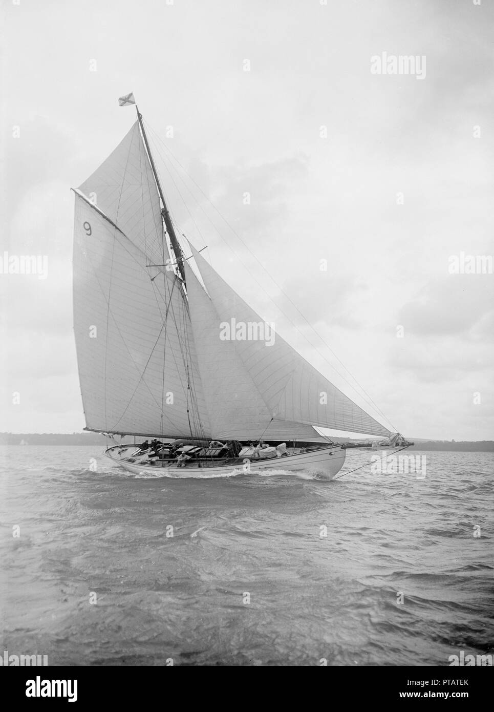 The cutter 'Westwind' sailing close-hauled, 1912. Creator: Kirk & Sons ...