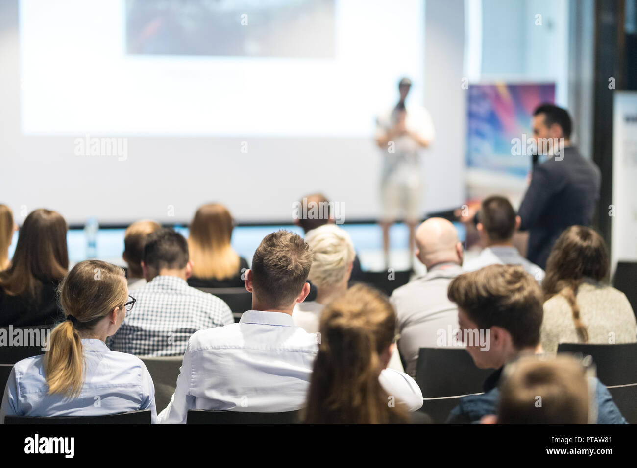Business speaker giving a talk at business conference event Stock Photo ...