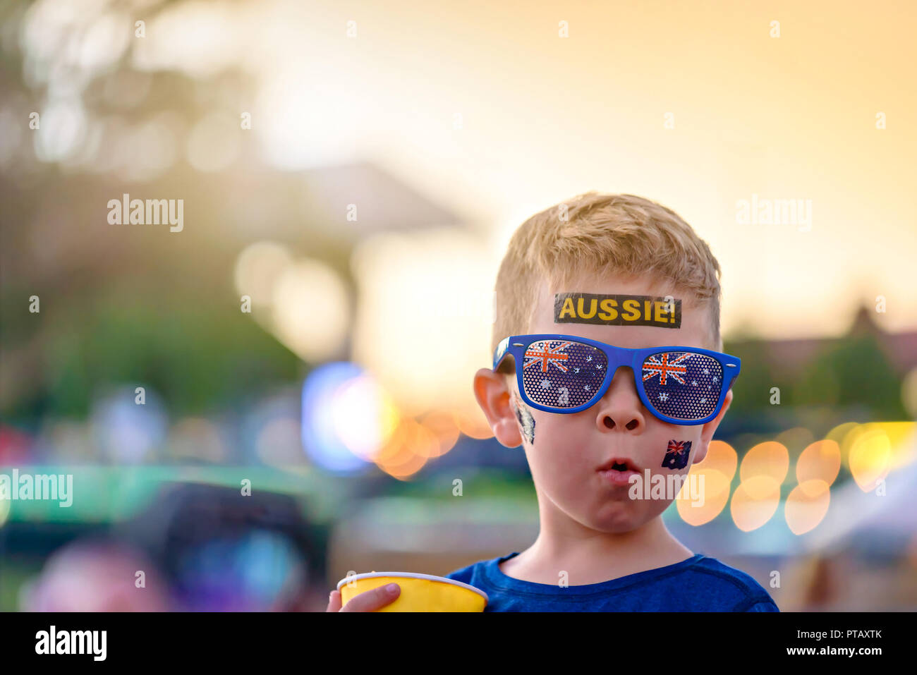 Cute Australian boy with flag tattoo on his face on Australia Day ...