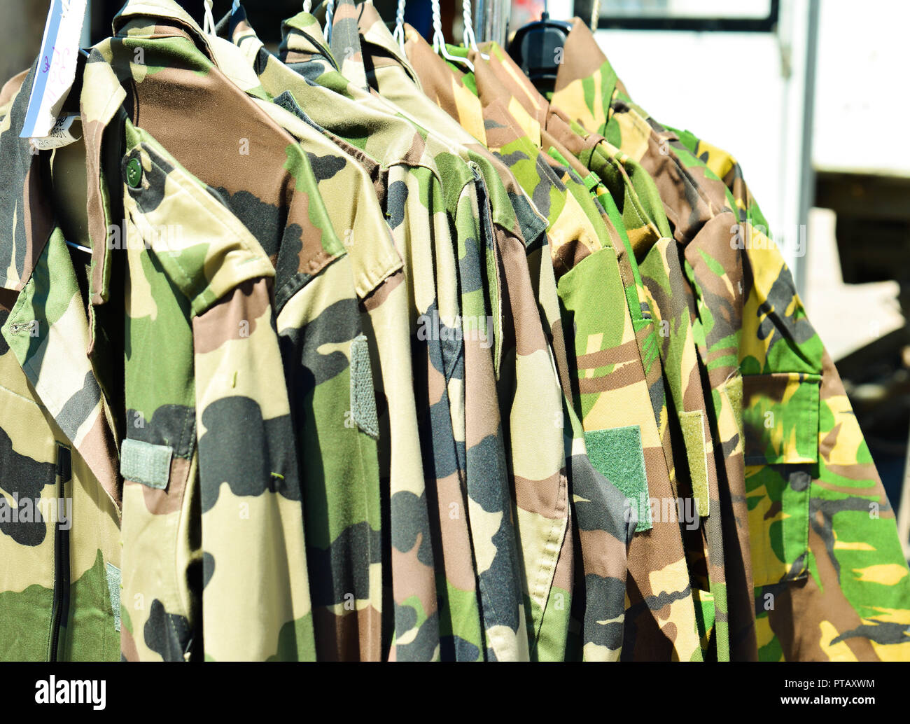 Military textile uniform camouflage sold on the market Stock Photo - Alamy