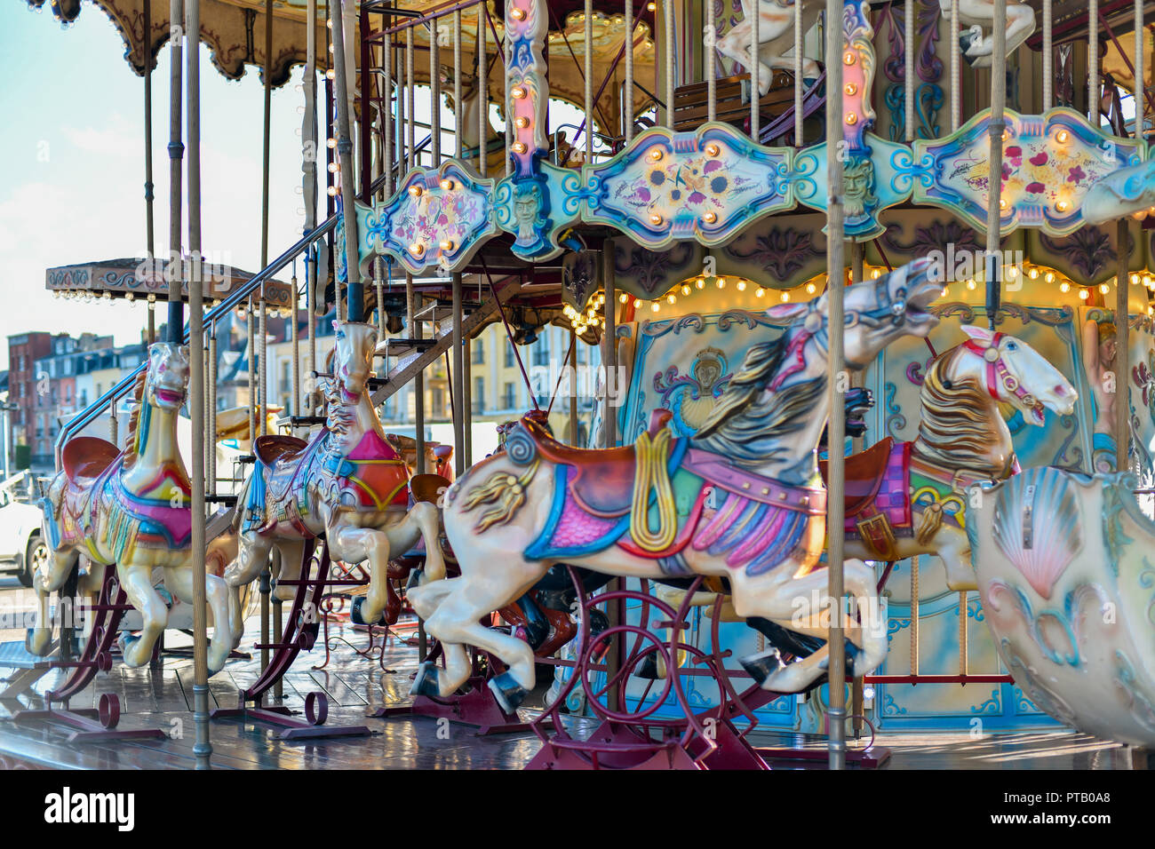 French vintage retro colorful carousel with lights Stock Photo - Alamy